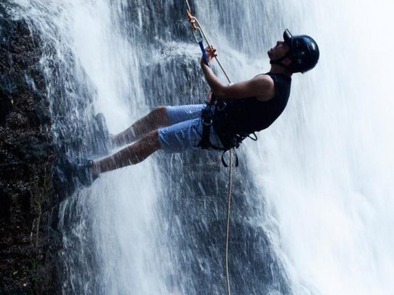 What is Abseiling and How to Do It | Abseiling Rock Descent